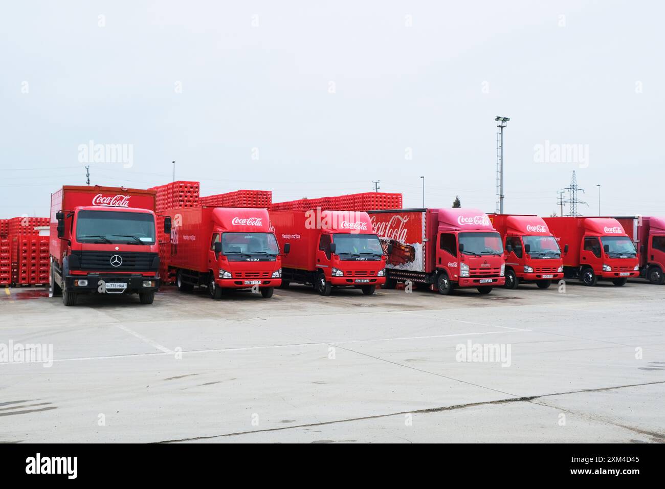Rows of red distribution trucks at the complex. At the CCI Coca Cola ...