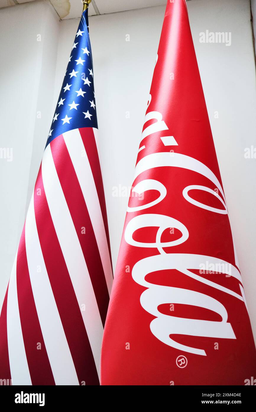 Two flags side by side, the USA and Coca Cola flags. At the CCI Coca ...