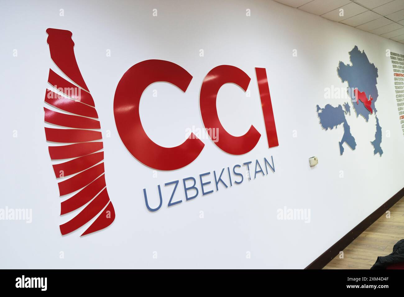 Cutout of CCI, Coca Cola International with iconic red bottle design. At the CCI Coca Cola soda ...