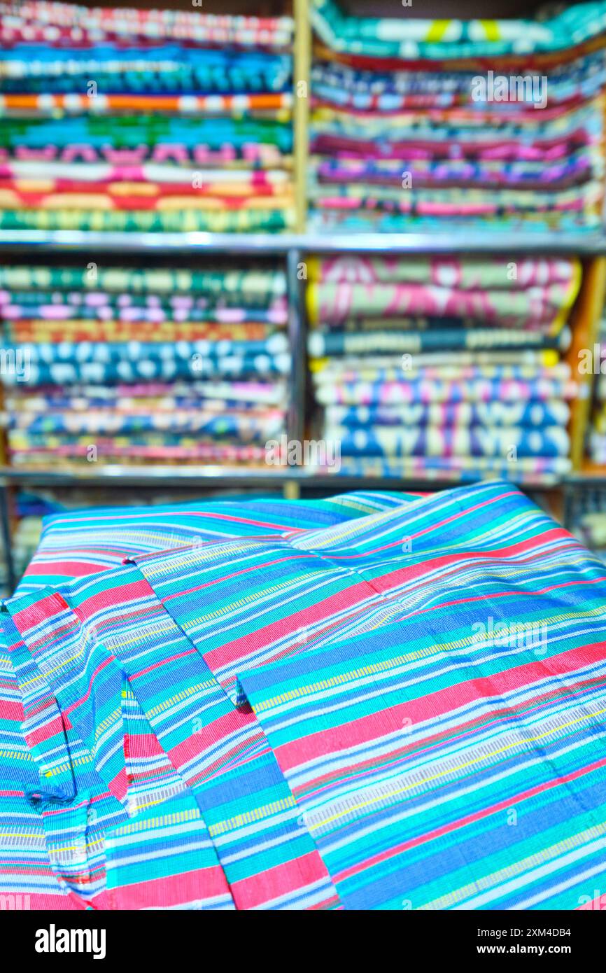A display of old, Russian striped silk fabric in a store, shop with ...