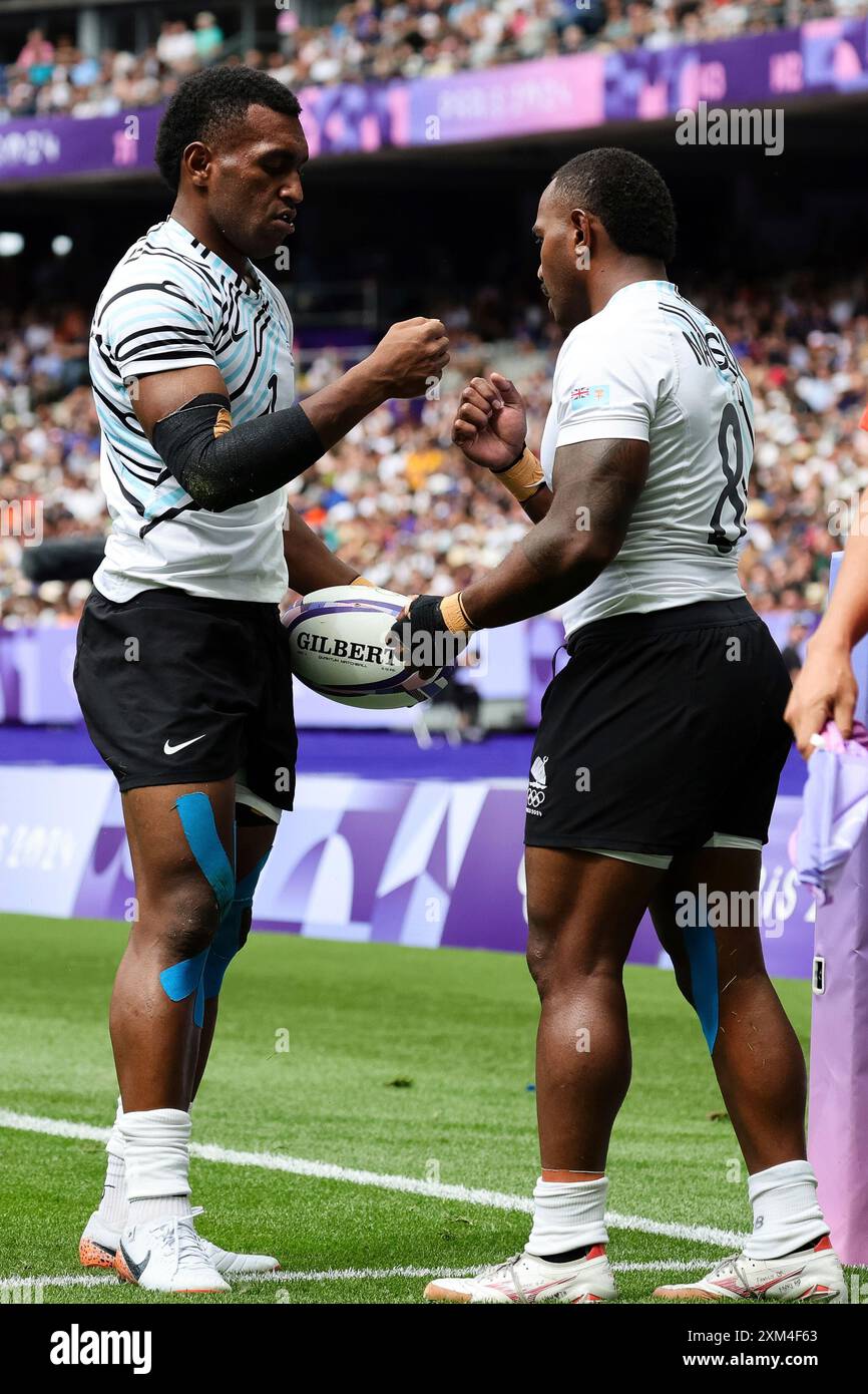 PARIS, FRANCE - JULY 25: Joji Nasova (1) of Team Fiji scores a try and ...
