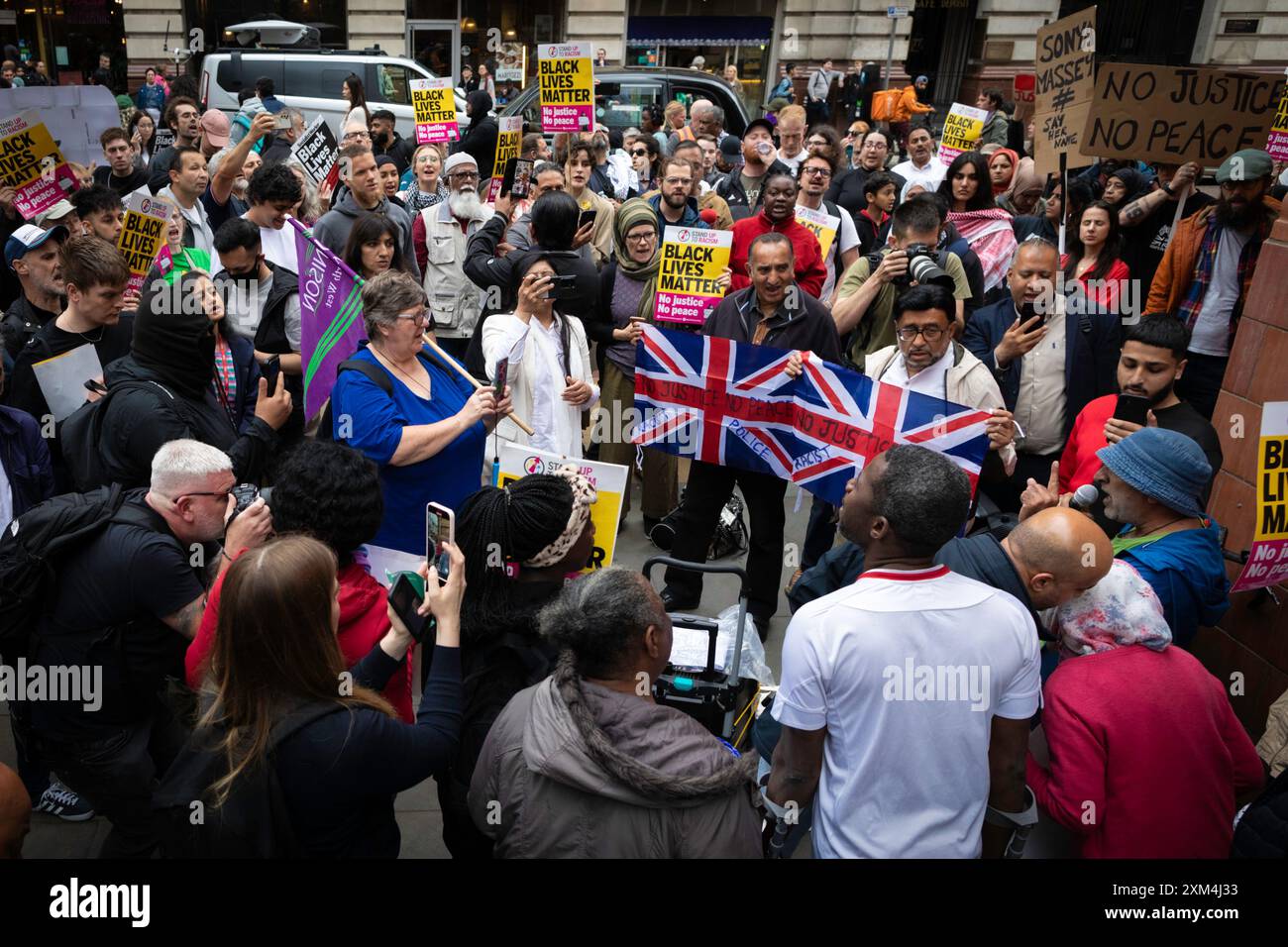 Manchester, UK. 25th July, 2024. People gather outside Andy Burnhams ...