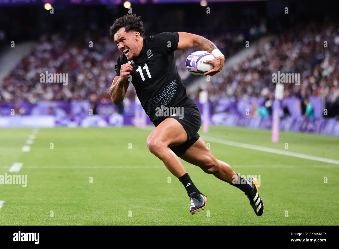 Paris, France, 25 July, 2024. Moses Leo (11) of Team New Zealand scores ...