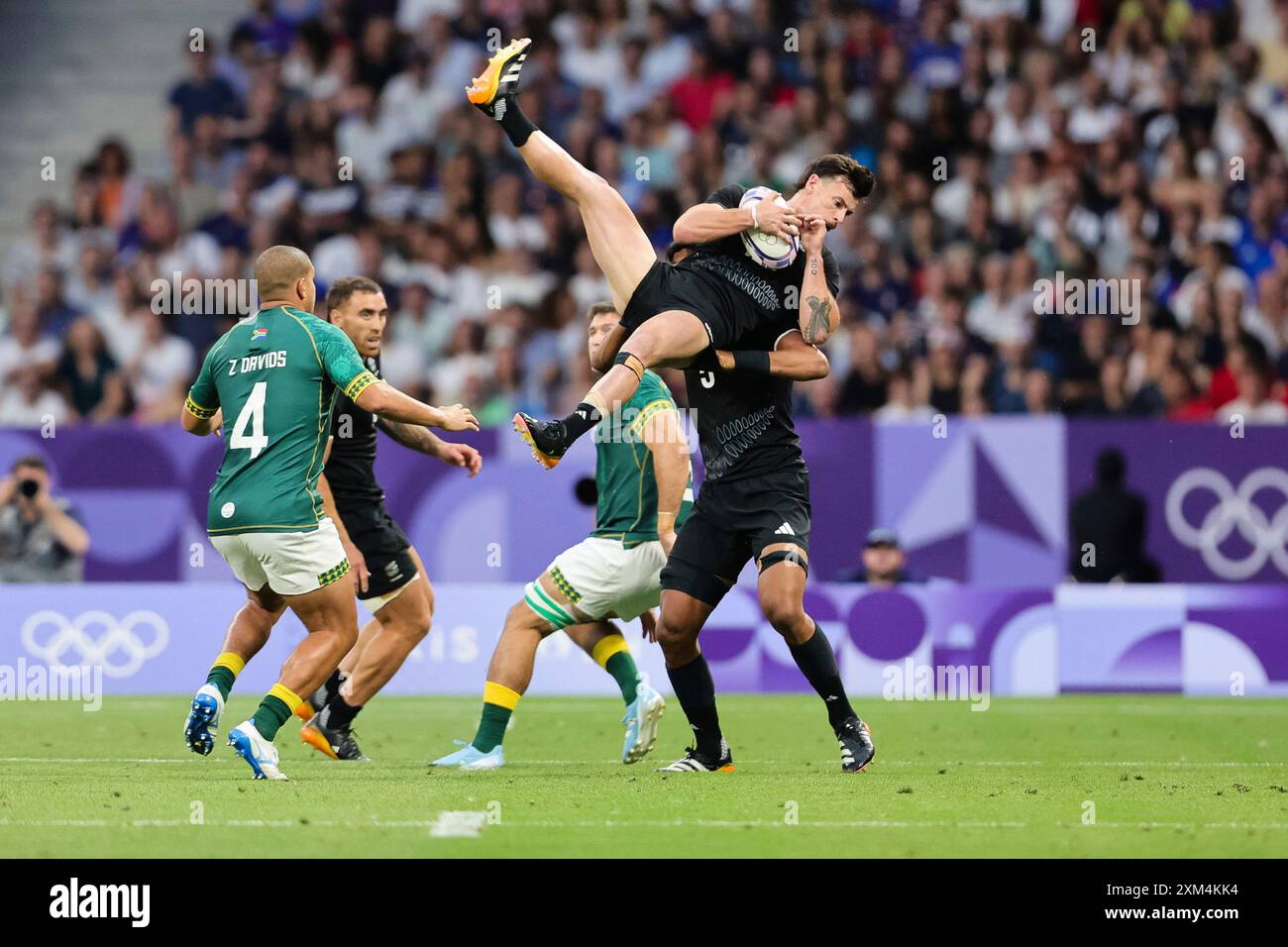PARIS, FRANCE - JULY 25: Leroy Carter (12) of Team New Zealand catches ...