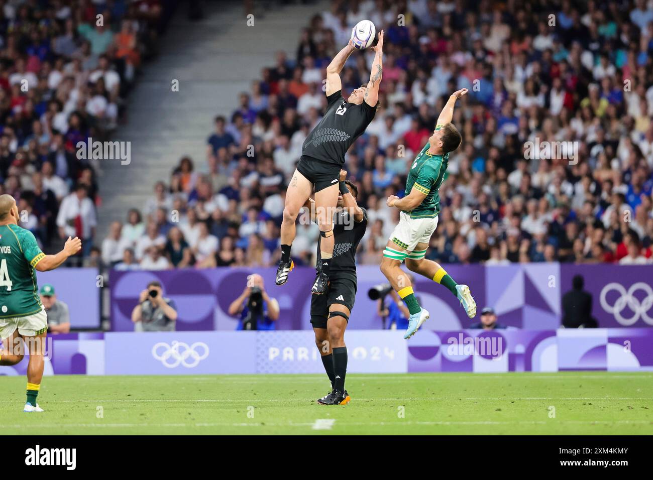 PARIS, FRANCE - JULY 25: Leroy Carter (12) of Team New Zealand catches ...