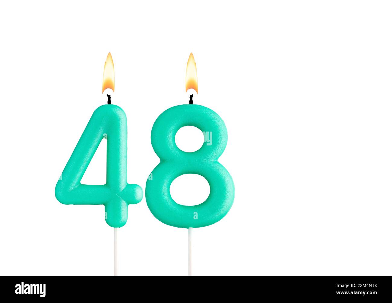 Birthday number 48 - Green birthday candle on white background Stock ...