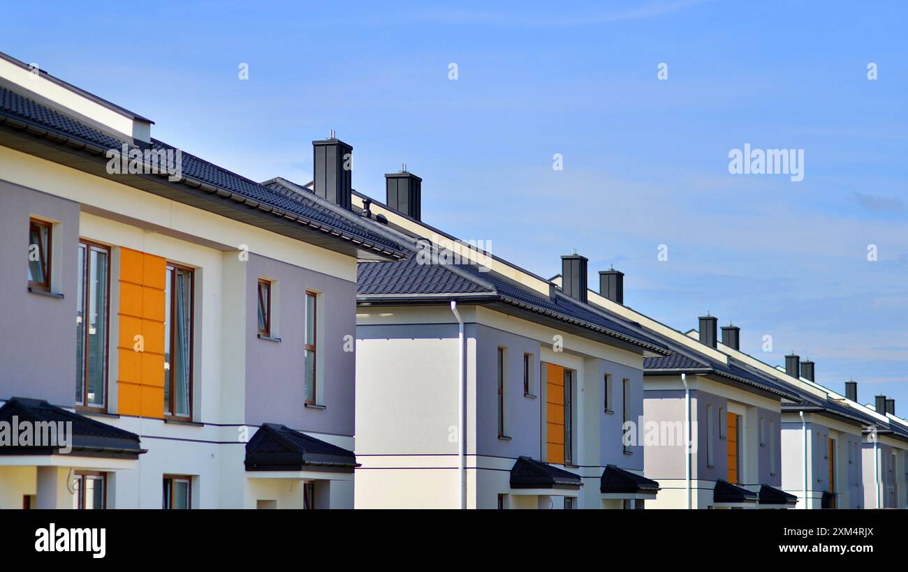 Terraced residential homes with modern facade in newly developed ...