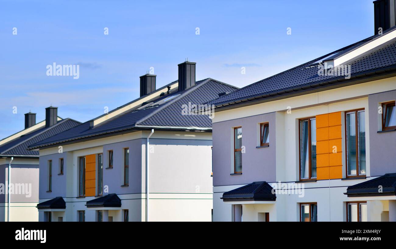 Terraced residential homes with modern facade in newly developed ...