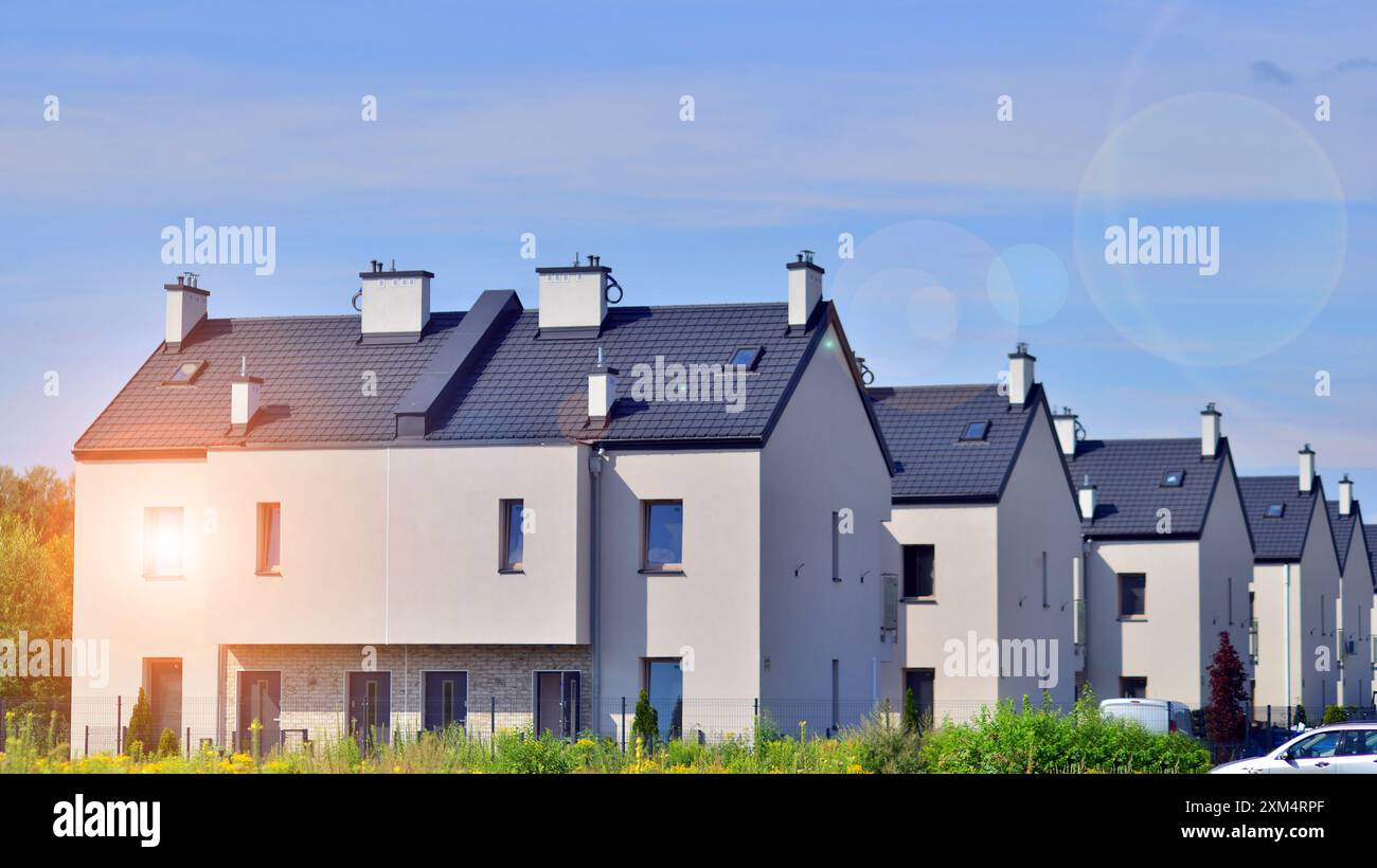 Terraced residential homes with modern facade in newly developed ...