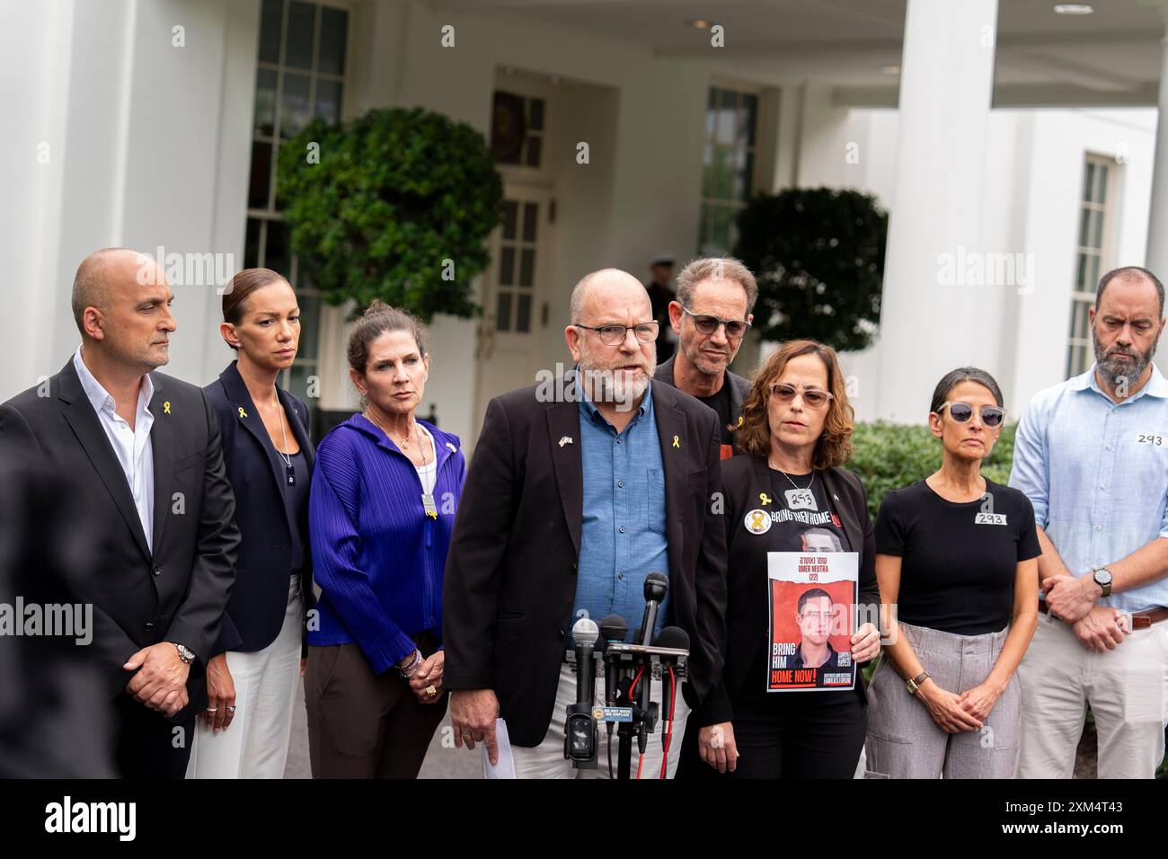 Jonathan Dekel-Chen, center, father of American hostage Sagui Dekel ...