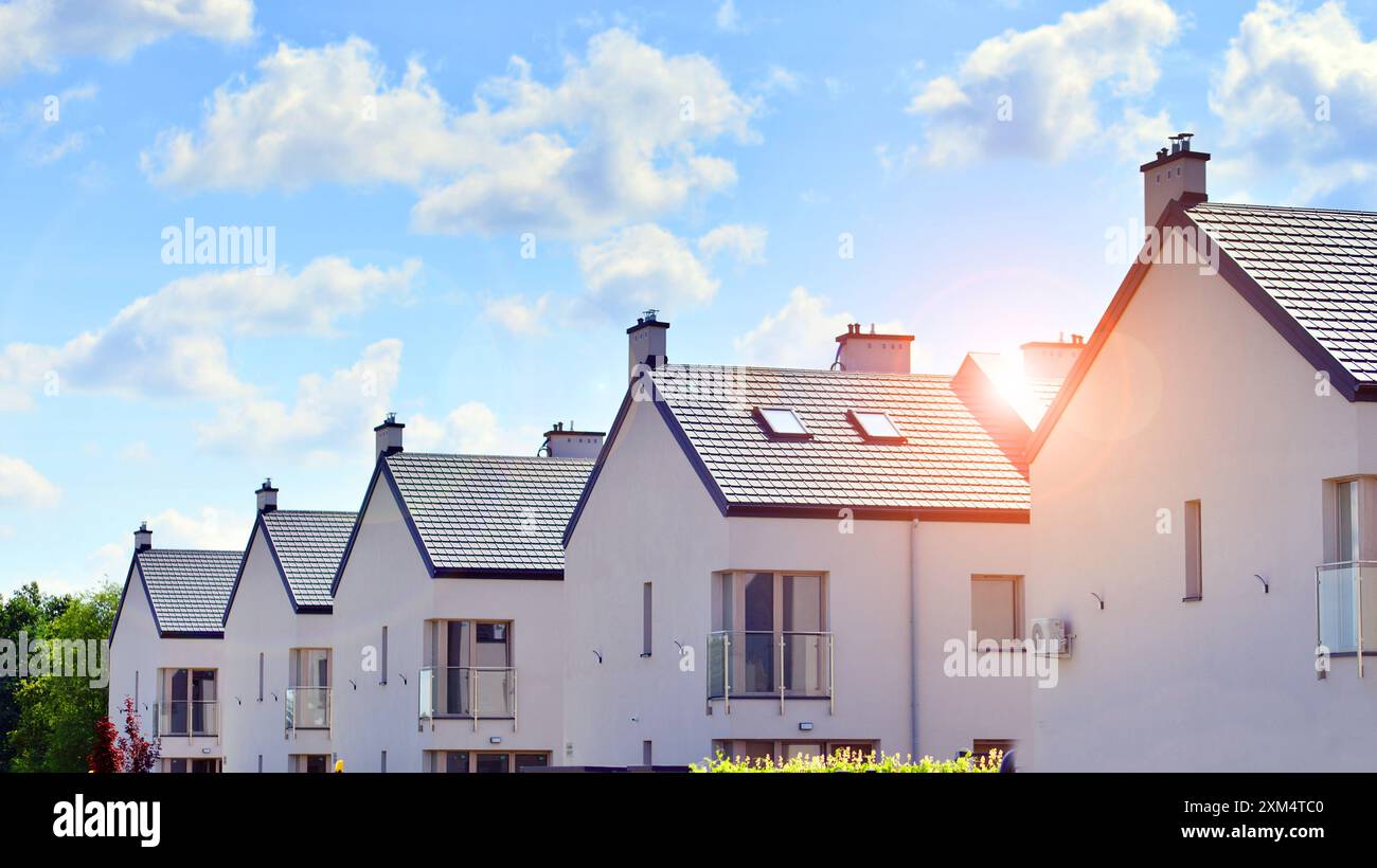 Terraced residential homes with modern facade in newly developed ...