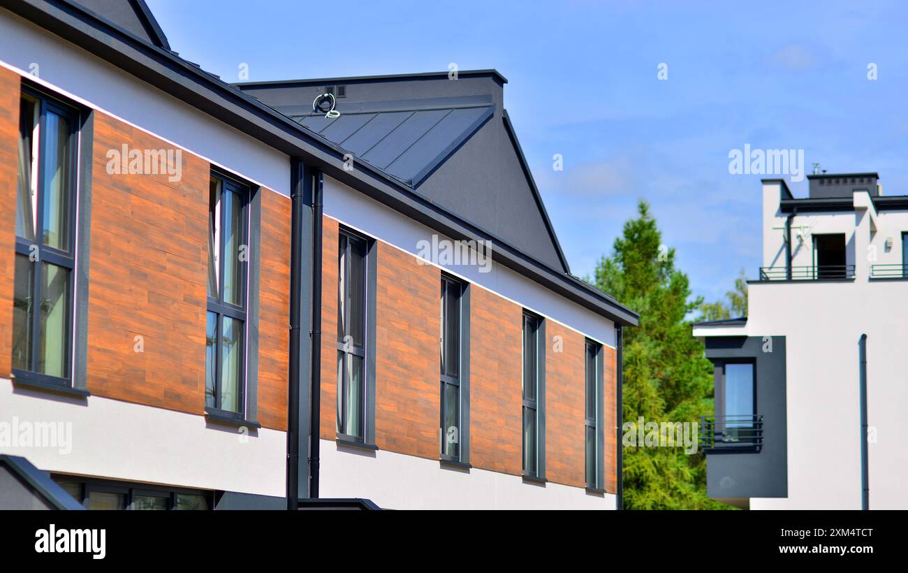 Terraced residential homes with modern facade in newly developed ...