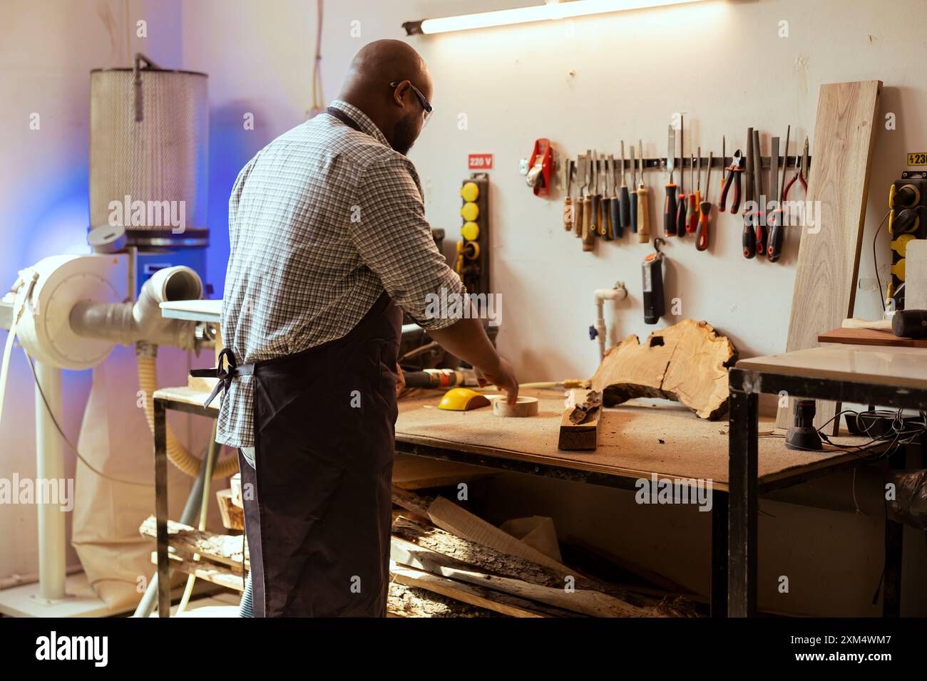 African american carpenter preparing to start production in messy ...