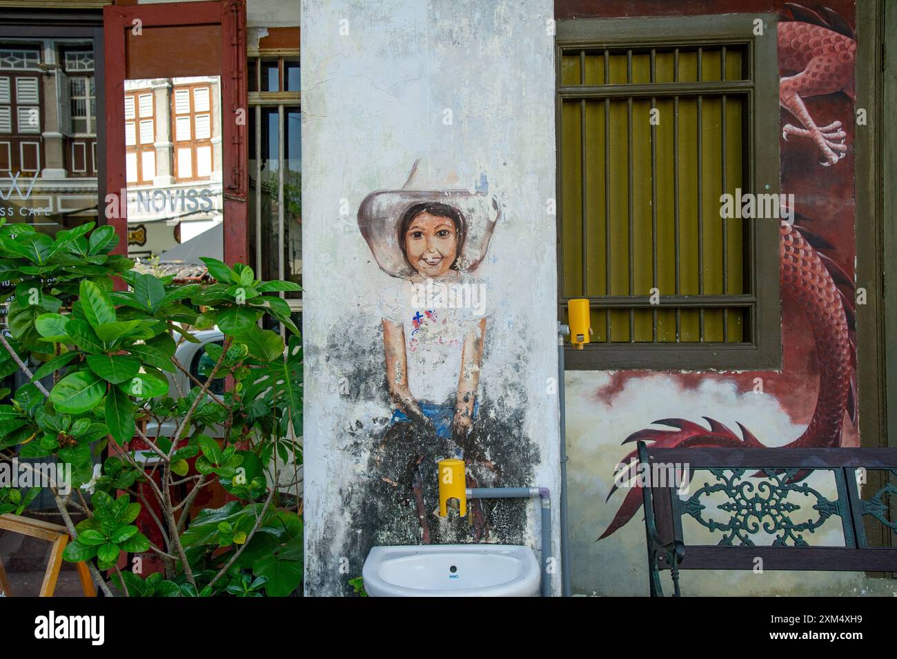 February 24 2023- George Town -Penang-Malaysia One of the famous murals on the walls of the old ...