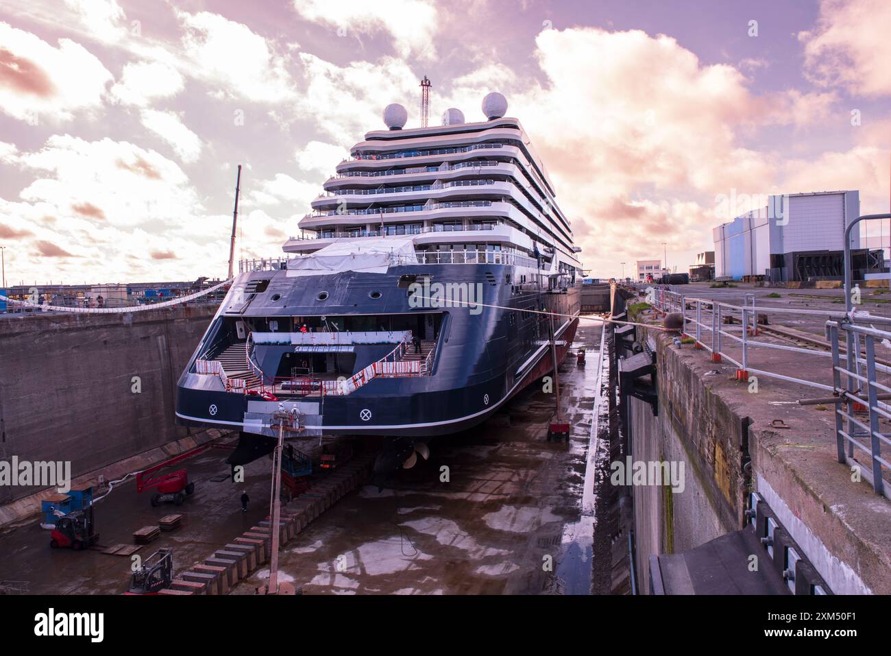 Ship in dry dock in a port for repairs Stock Photo - Alamy