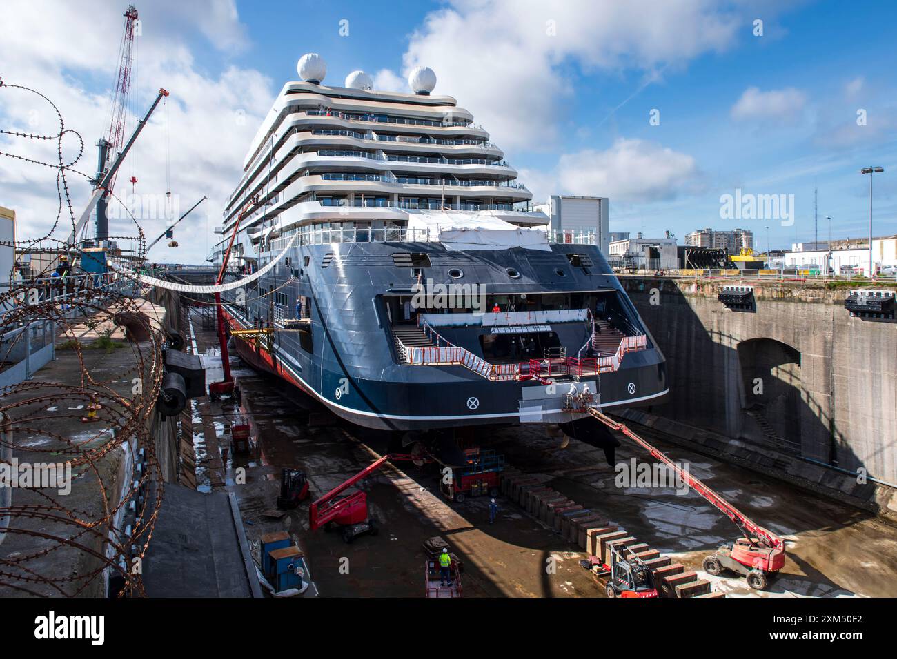 Ship in dry dock in a port for repairs Stock Photo - Alamy