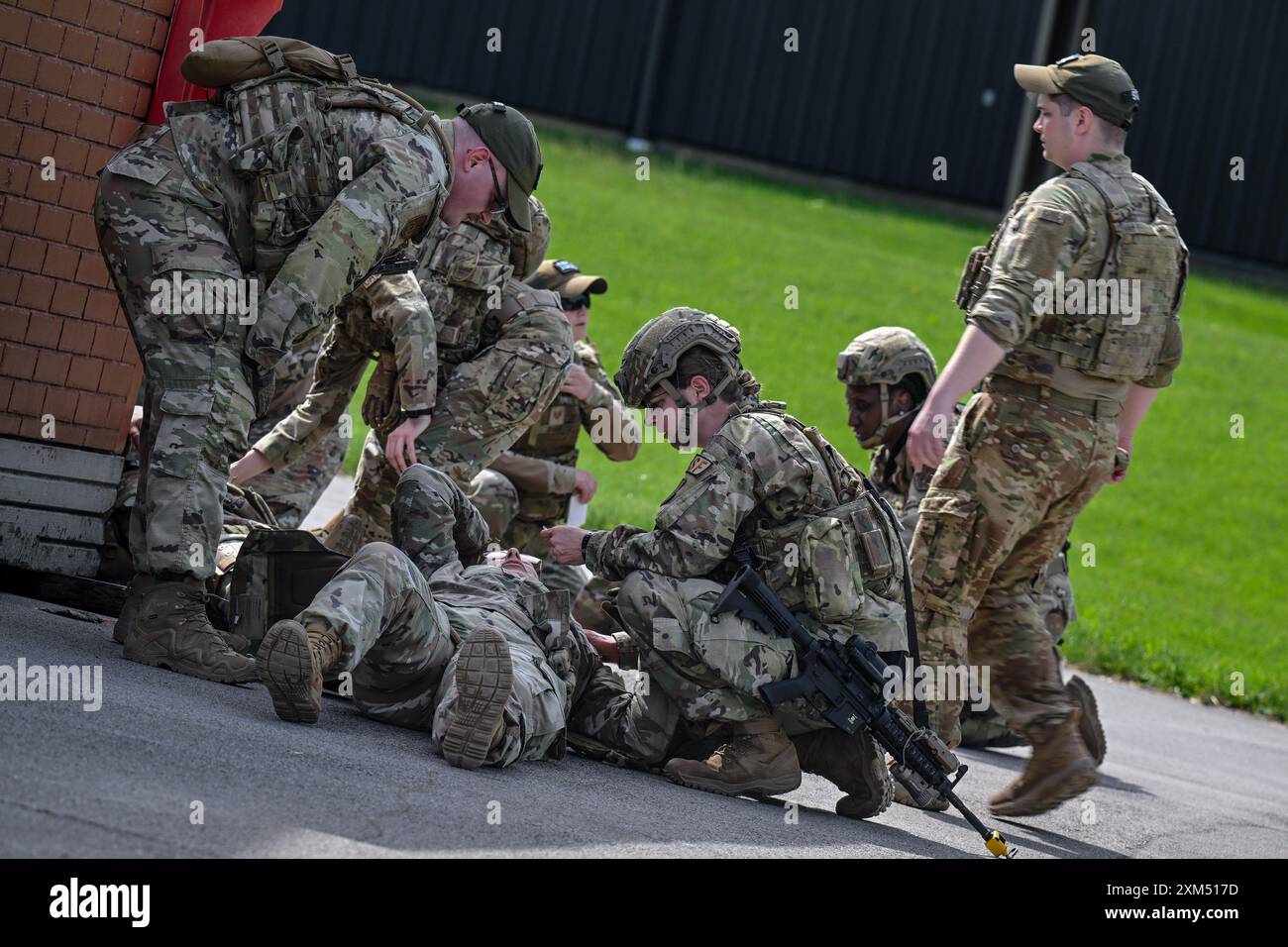 Integrated Defense Leadership Course students perform tactical combat casualty care on fellow ...