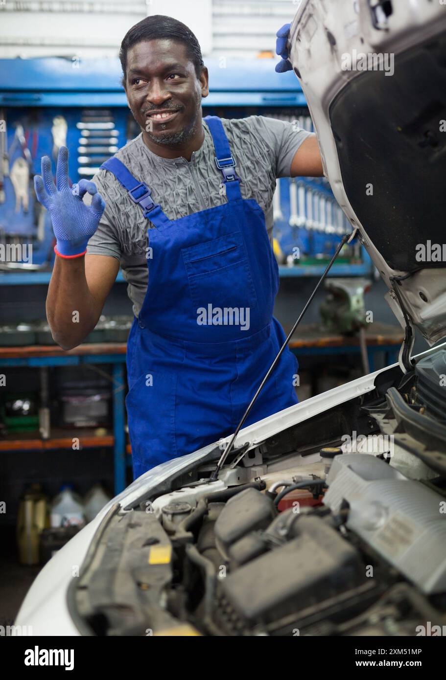 Positive african man makes hi-res stock photography and images - Alamy