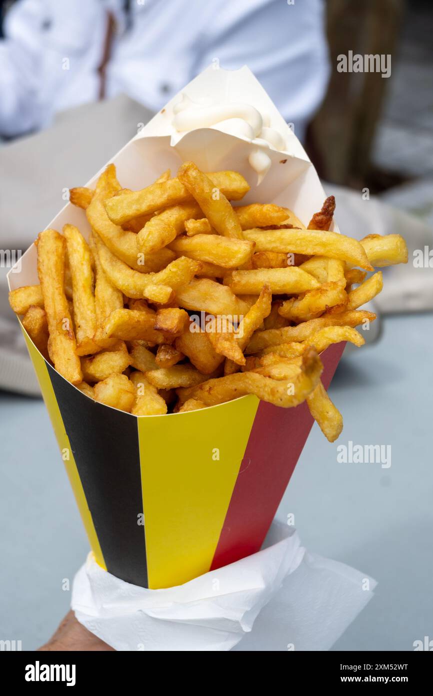 Belgian street and fast food, paper cone bag in colors of Belgian flag ...