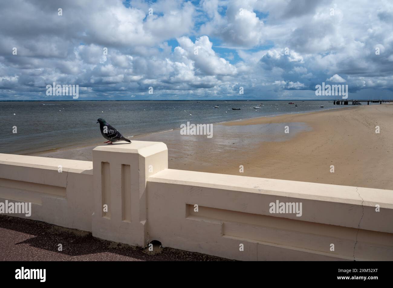 Walking on beach promenade in sunny Arcachon, vacation destination town ...