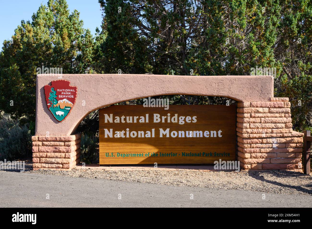 Blanding, UT, USA - June 18, 2024; Entrance sign with stone arch at ...