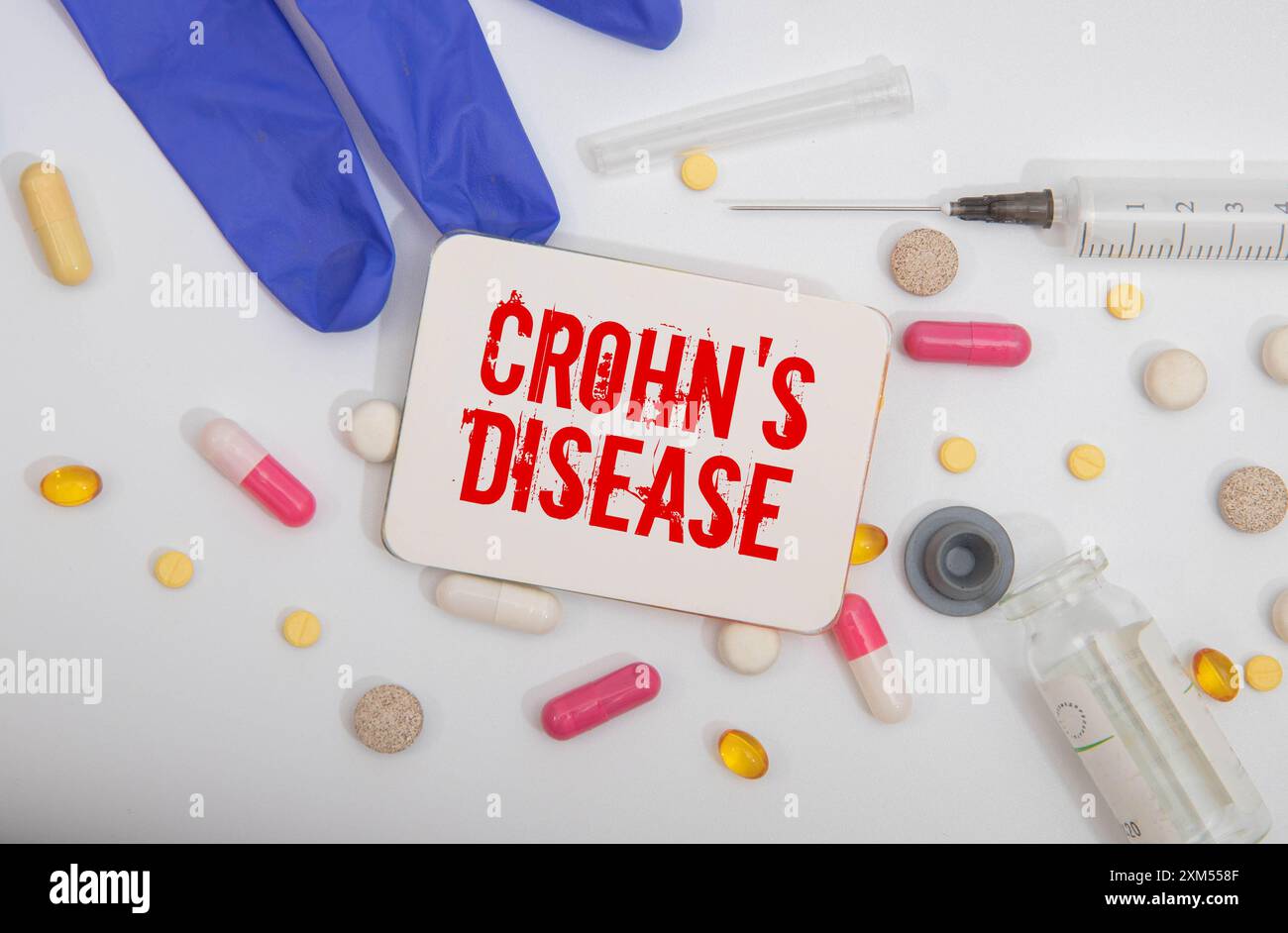 Doctor holding a card with Crohn's disease medical concept Stock Photo ...