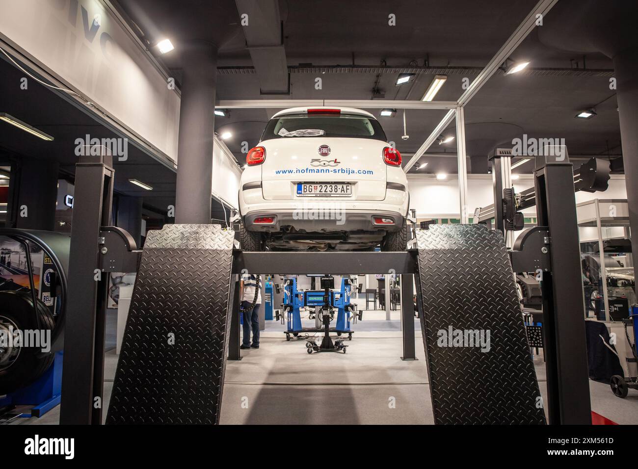 This photo shows a car undergoing a technical inspection at a mechanic ...