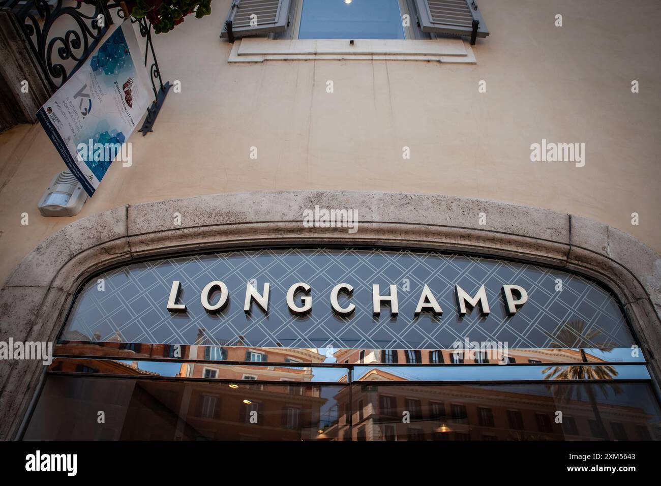 Picture of a sign with the logo of Longchamp on their store for Rome ...