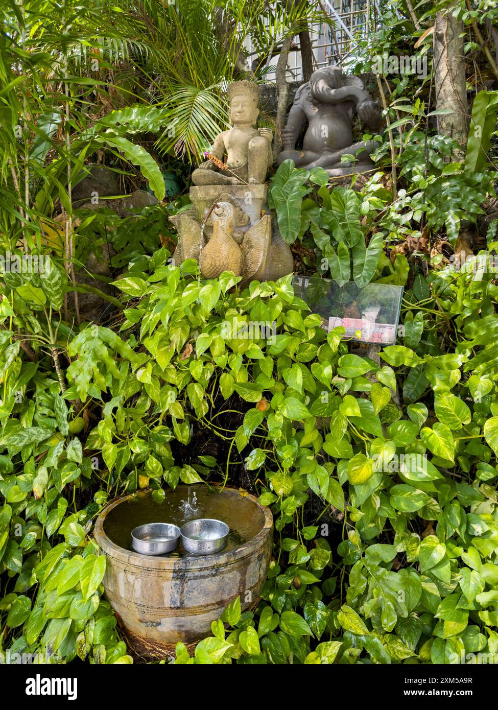 Exterior view of a small garden and offering spot inside the Royal ...