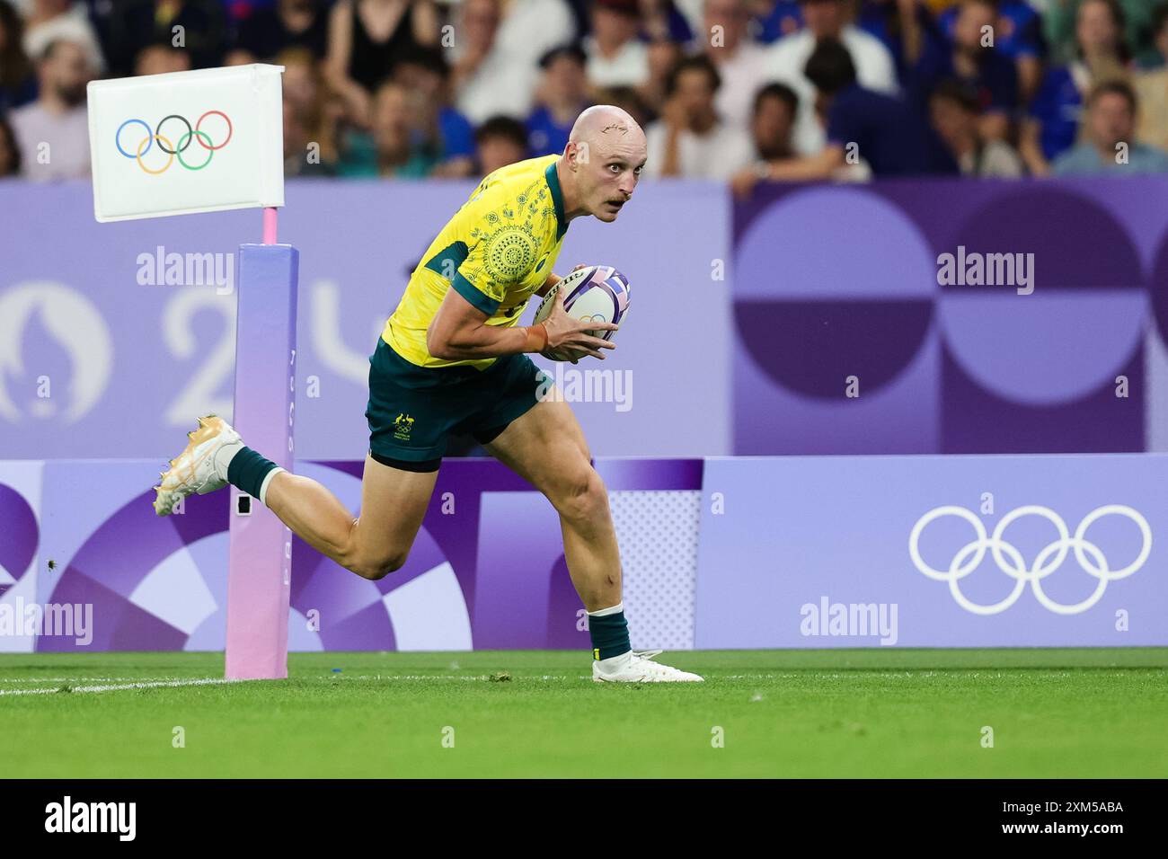 Paris, France, 25 July, 2024. James Turner (8) of Team Australia scores ...