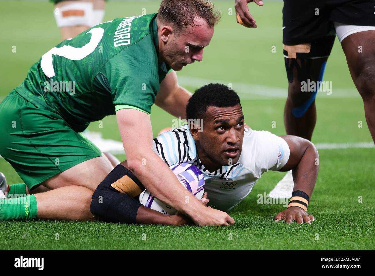 Paris, France, 25 July, 2024. Joji Nasova (1) of Team Fiji scores a try ...