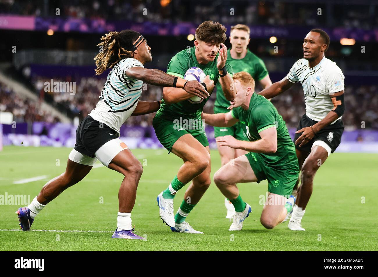 Paris, France, 25 July, 2024. Chay Mullins (6) of Team Ireland runs the ...
