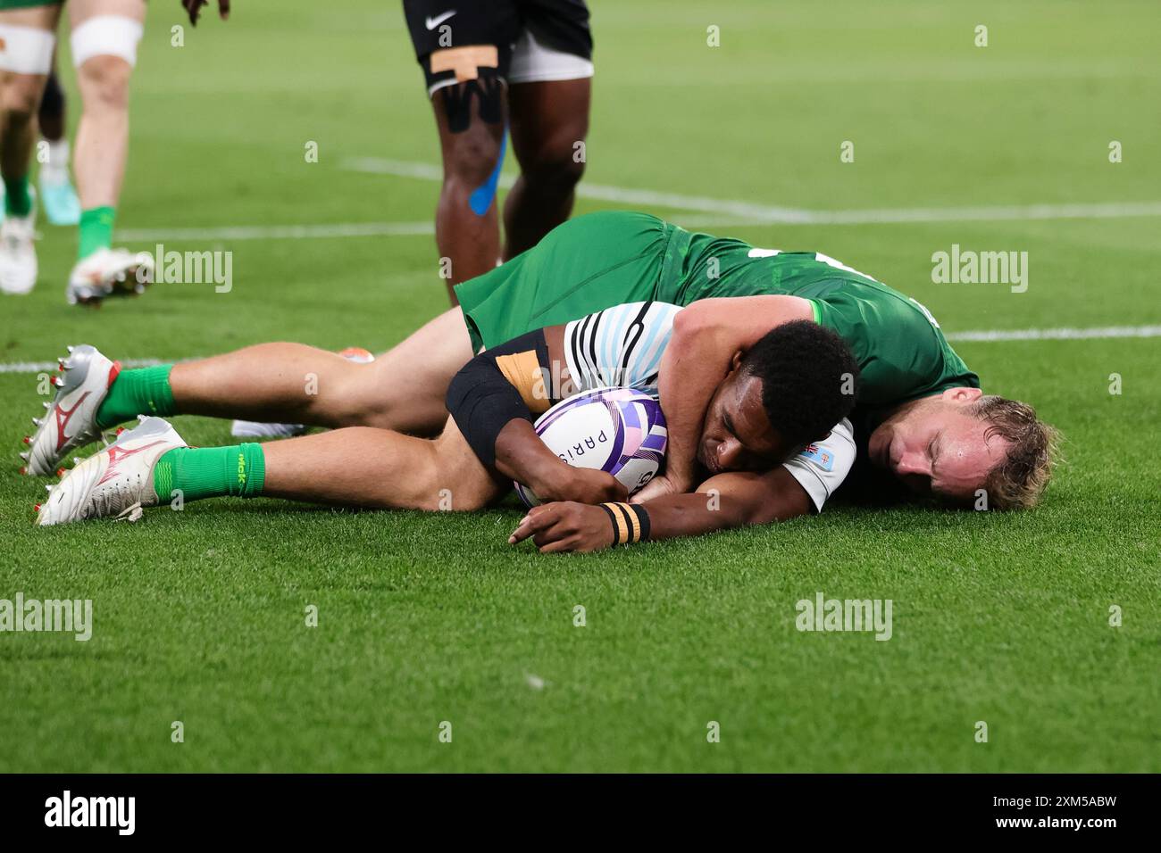 Paris, France, 25 July, 2024. Joji Nasova (1) of Team Fiji scores a try ...