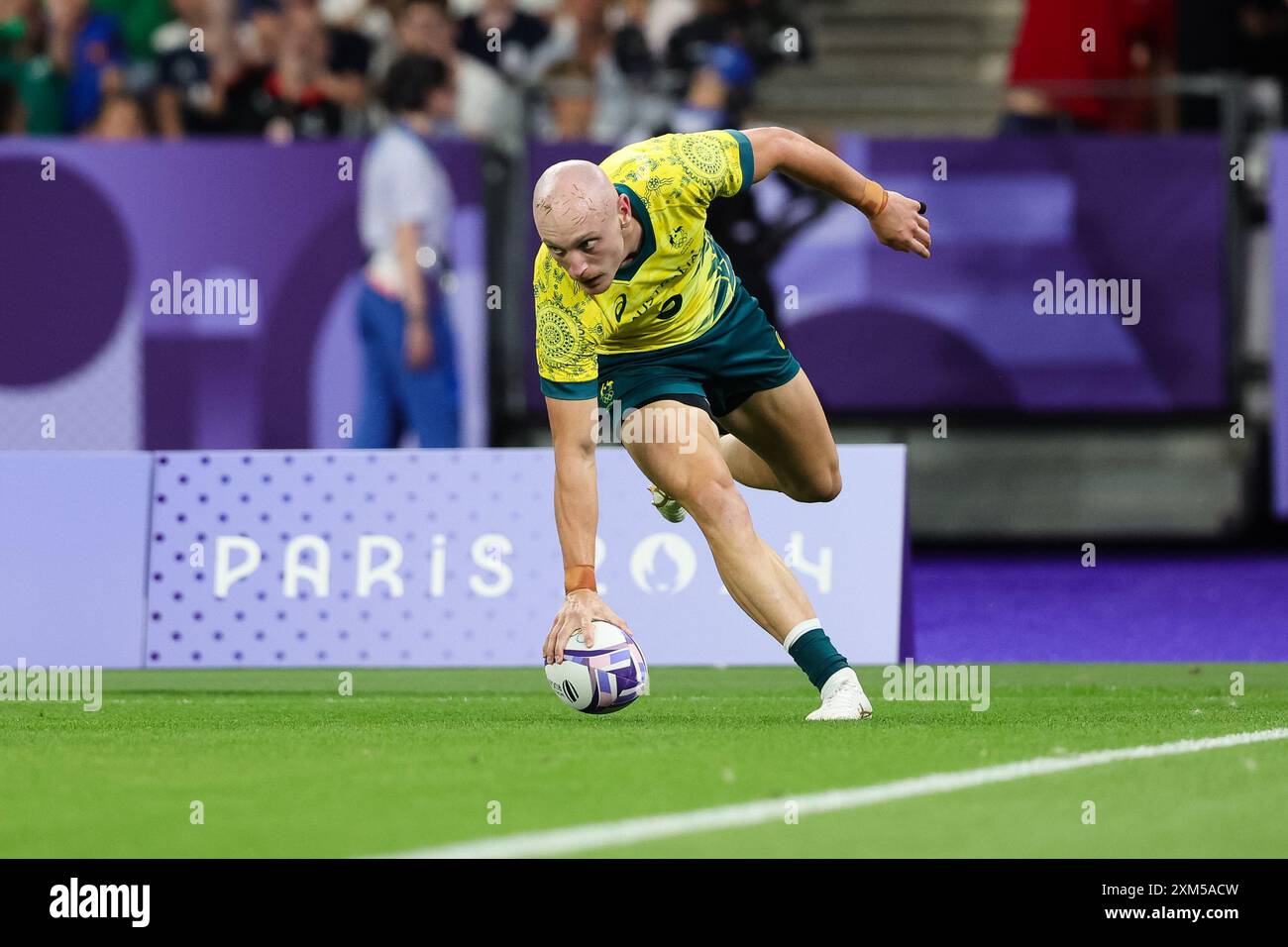 Paris, France, 25 July, 2024. James Turner (8) of Team Australia scores ...