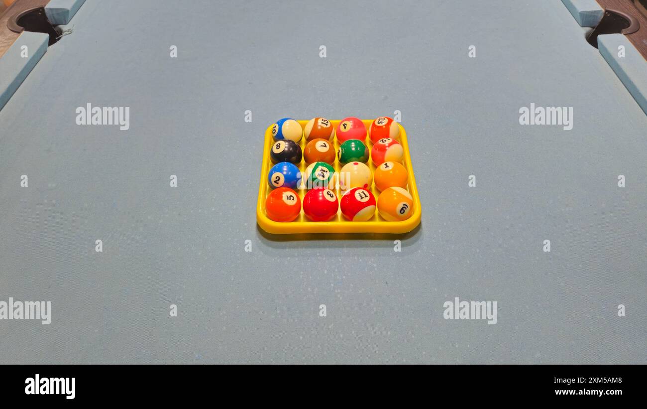 Top view of pool billiard balls in the square tray. 8 ball pool or ...