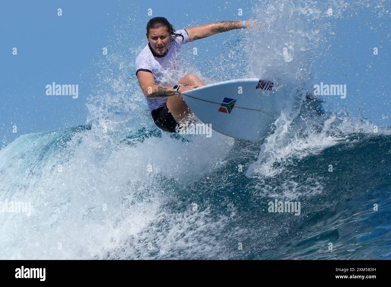 Sarah Baum, of South Africa, surfs on a training day ahead of the 2024 ...