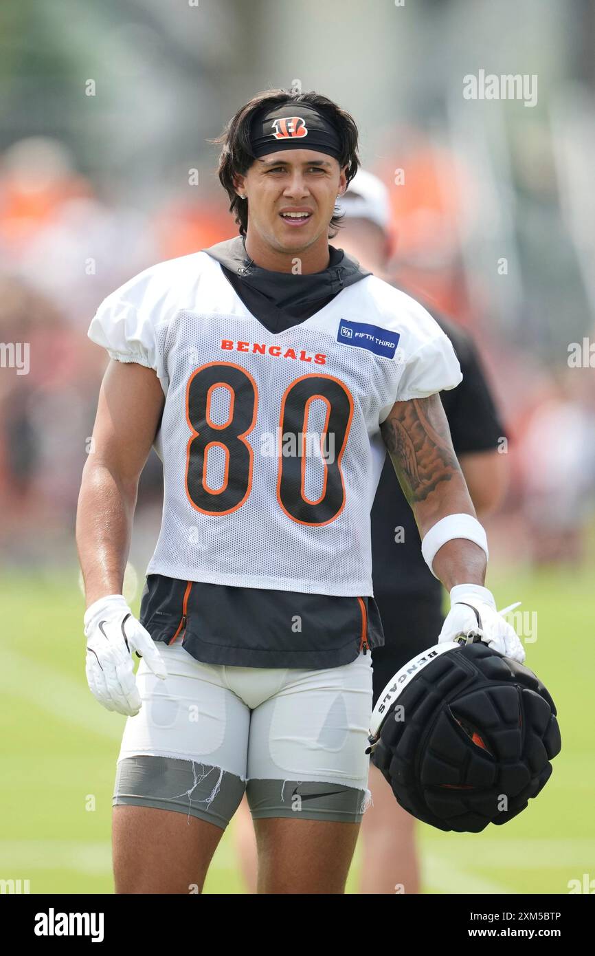 Cincinnati Bengals wide receiver Andrei Iosivas (80) takes off his helmet during a break during ...