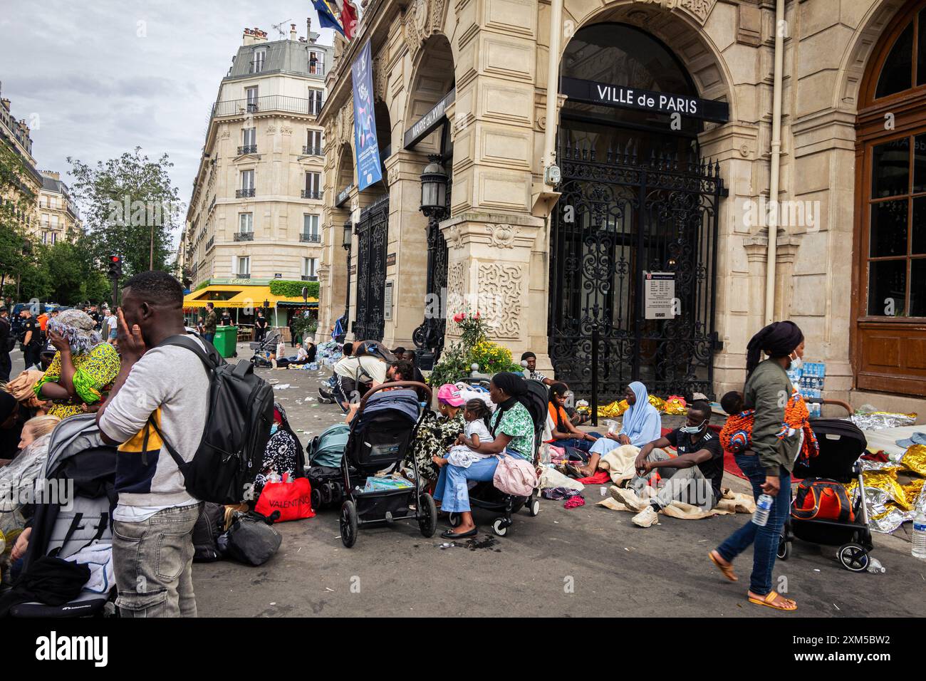 Homeless families await a housing solution in front of the 18th ...