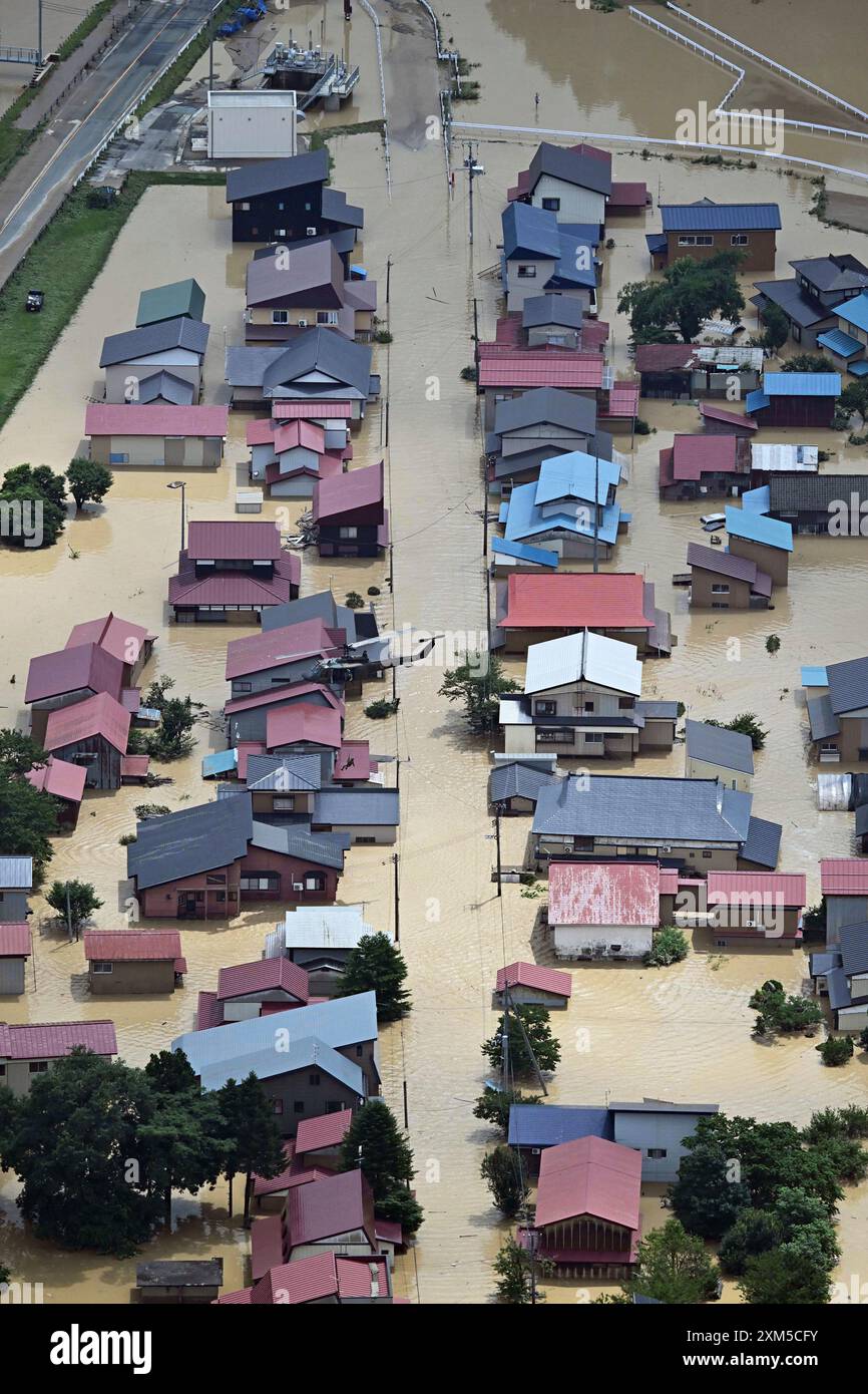 An aerial photo shows a water-covered village due to a flooding of ...