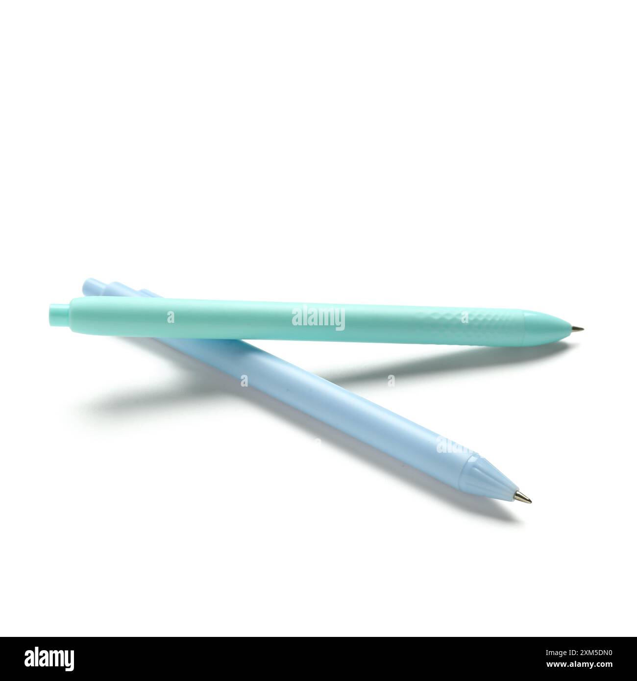 Blue ballpoint pens on white background Stock Photo - Alamy