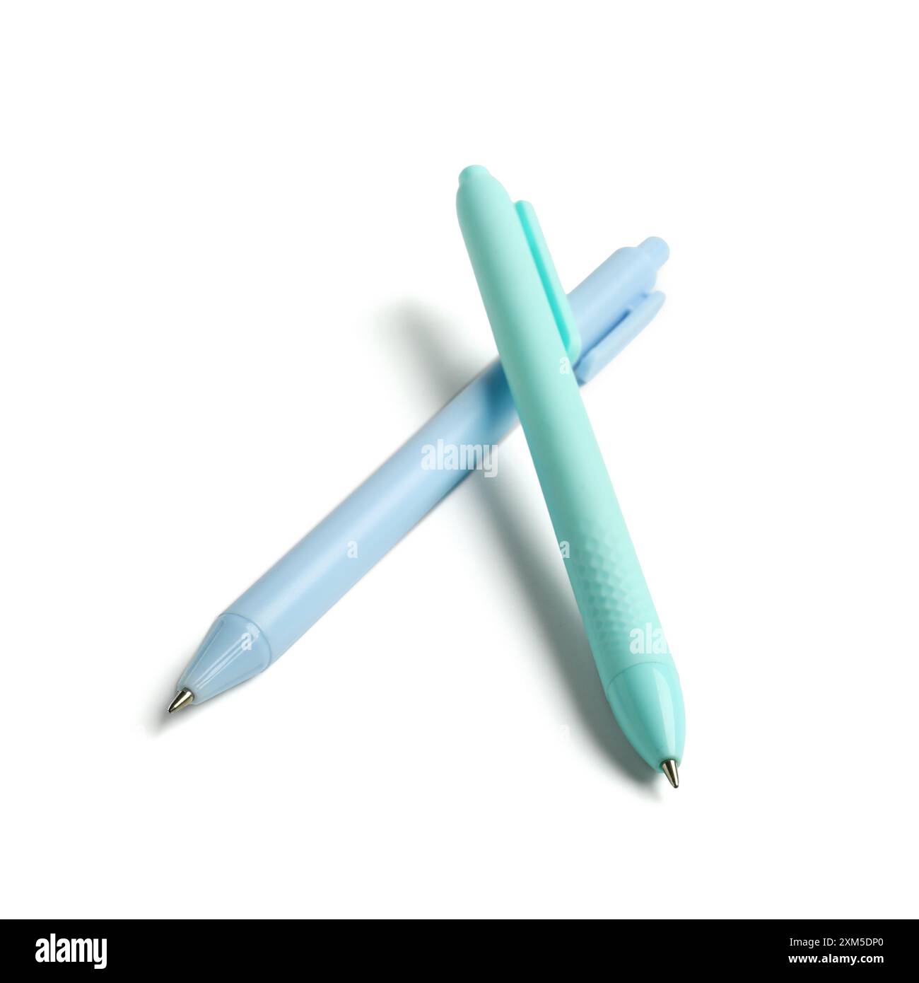 Blue ballpoint pens on white background Stock Photo - Alamy