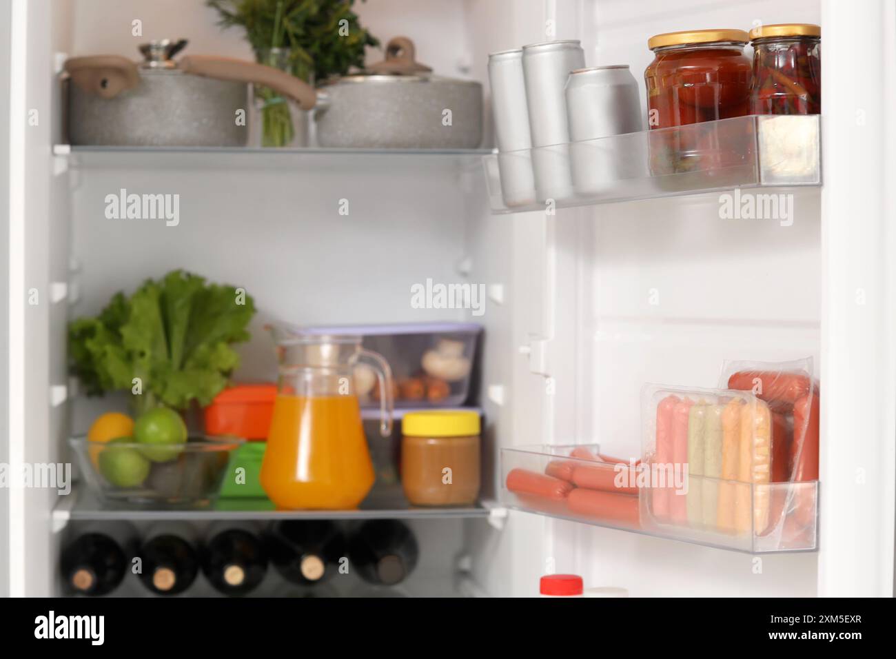 Open fridge full of fresh food. Closeup Stock Photo - Alamy