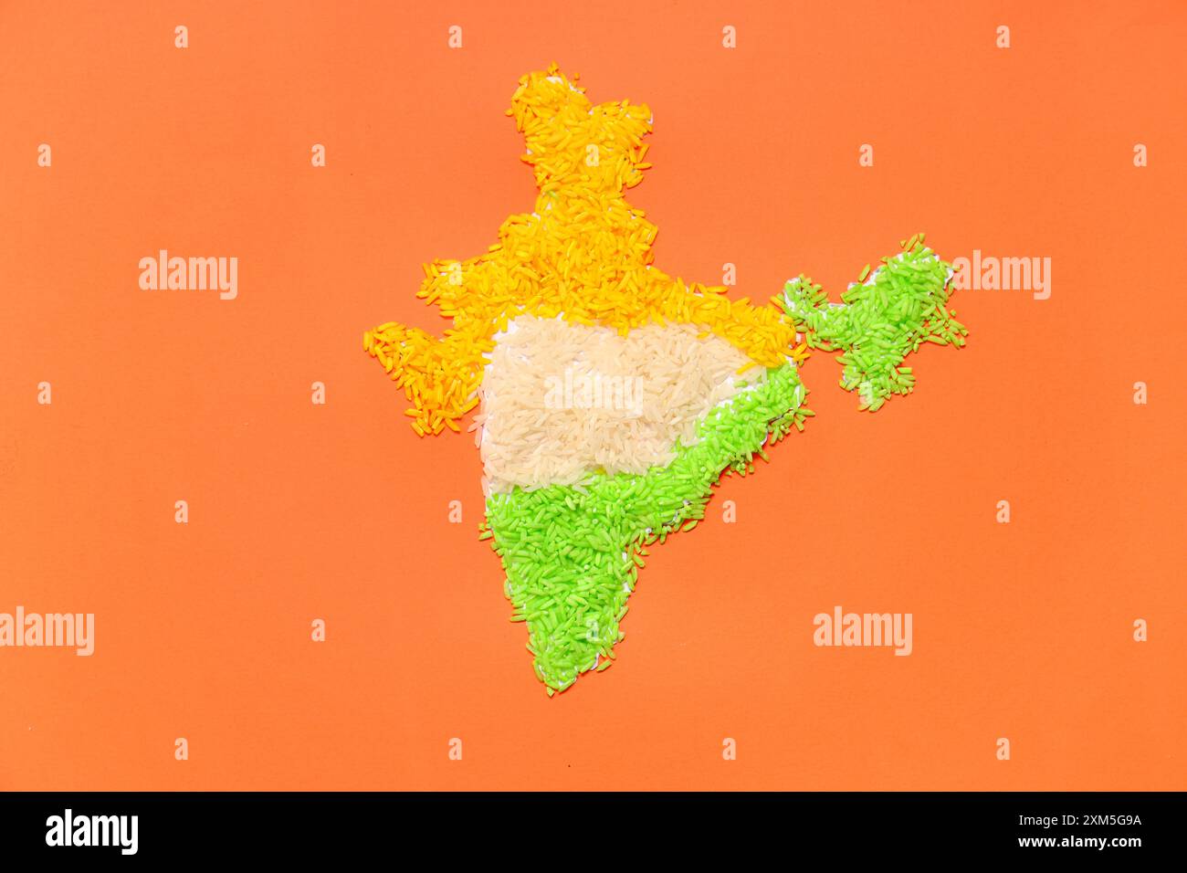 Indian continent made from colorful rice on orange background. Indian ...