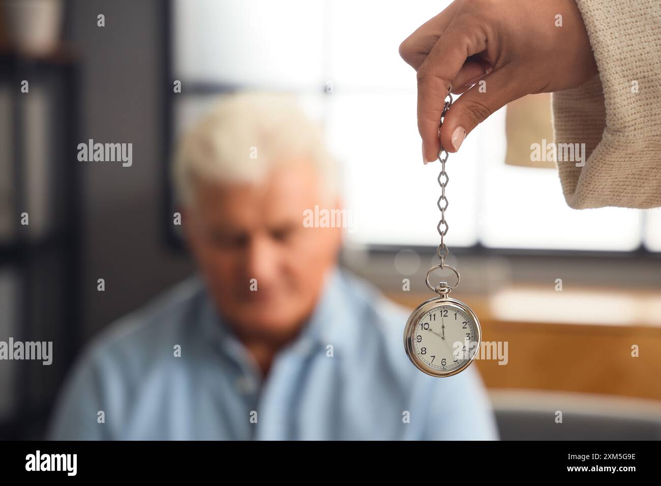 Pocket watch swinging hi-res stock photography and images - Alamy