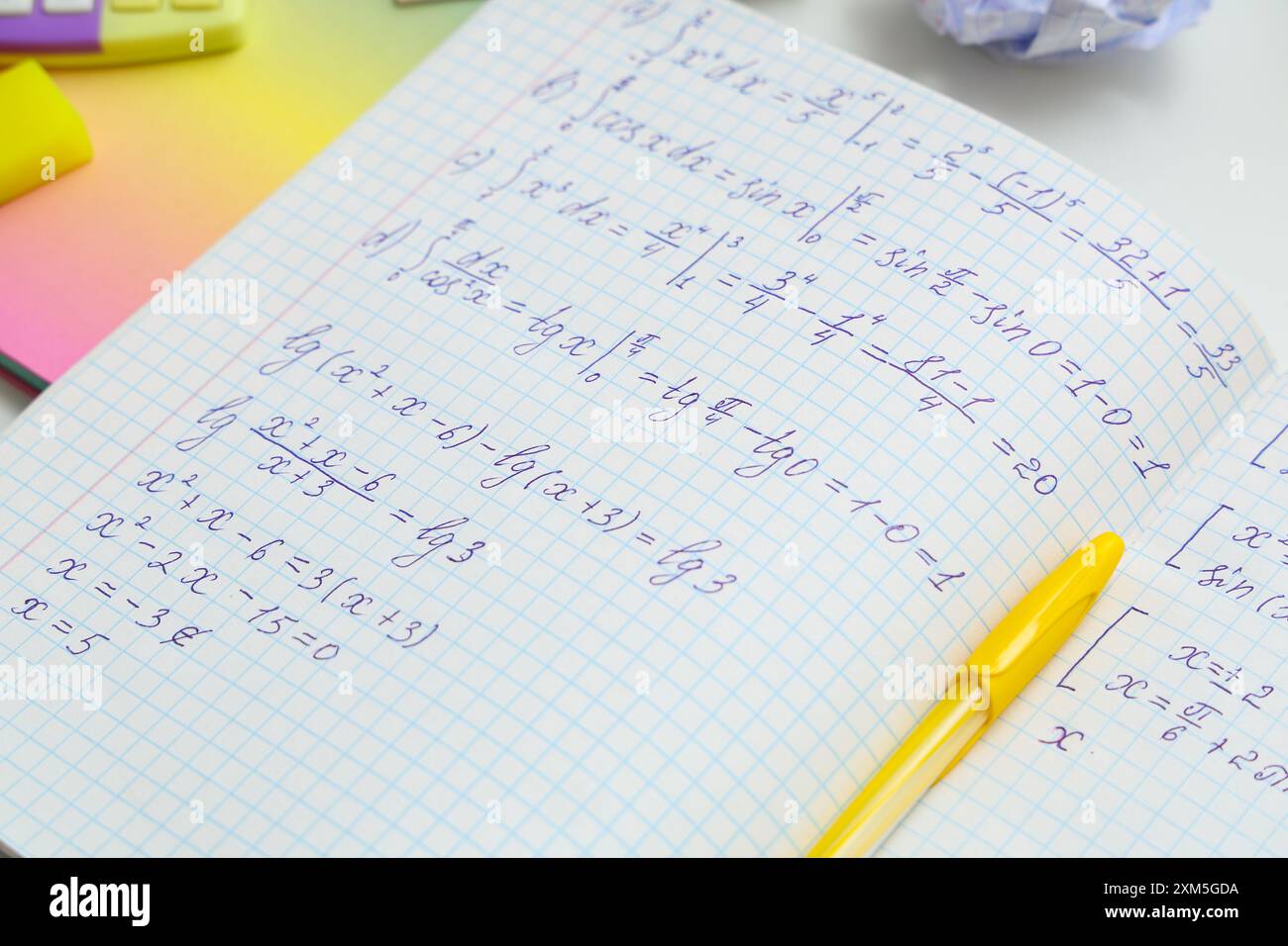 Open copybook with math formulas and pen on table, closeup Stock Photo ...