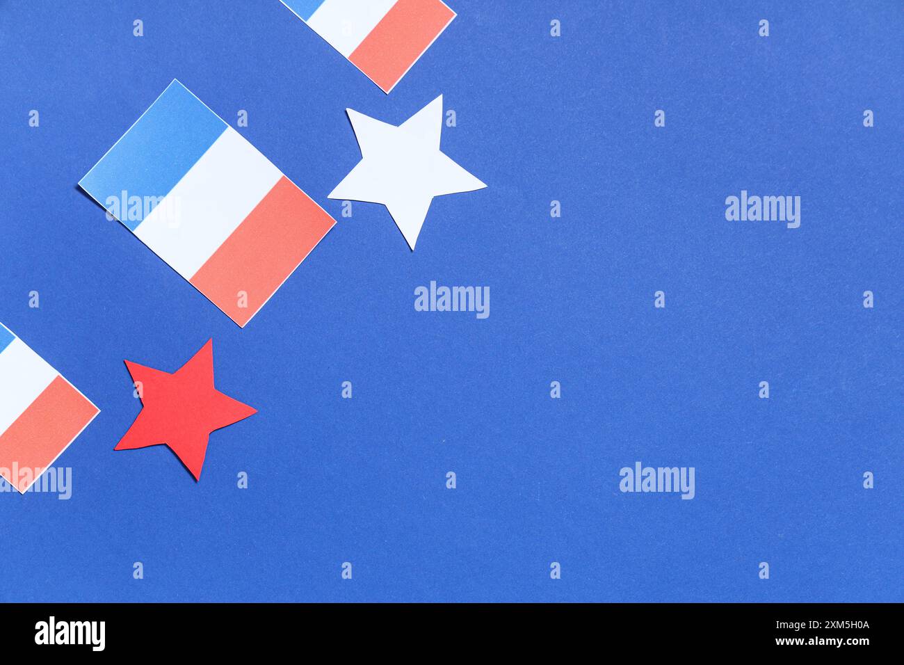 French flags and stars on blue background. Bastille Day celebration ...
