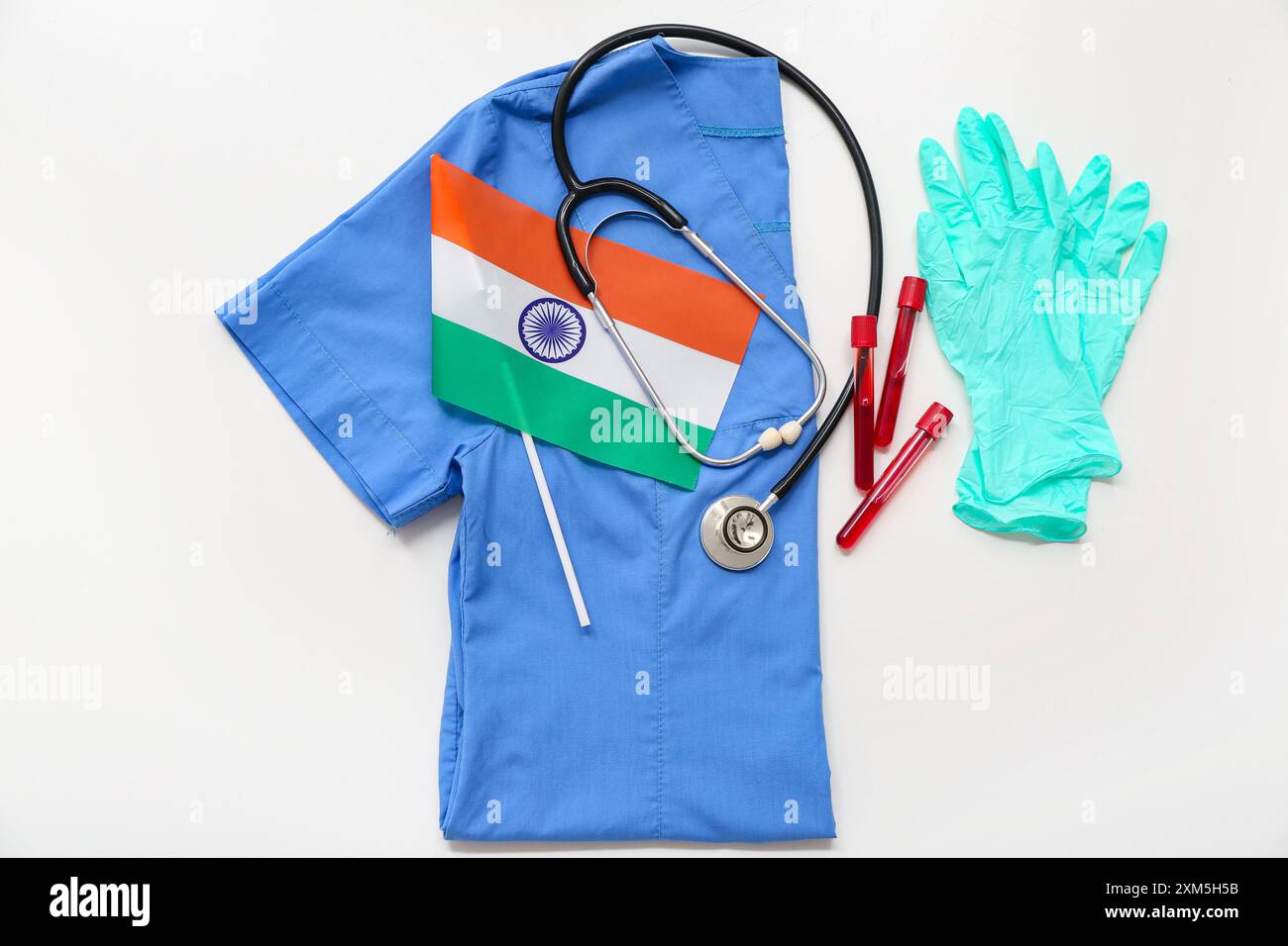 Test tubes, stethoscope, doctor's uniform and flag of India on white ...