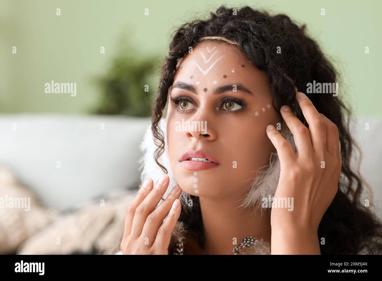 African-American female shaman performing ritual at home Stock Photo ...