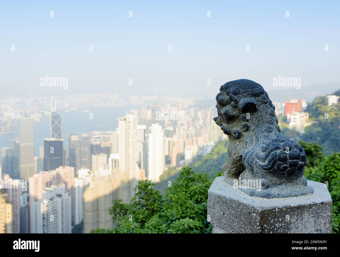 Statue of a lion on the Victoria Peak and view of Hong Kong city Stock Photo - Alamy