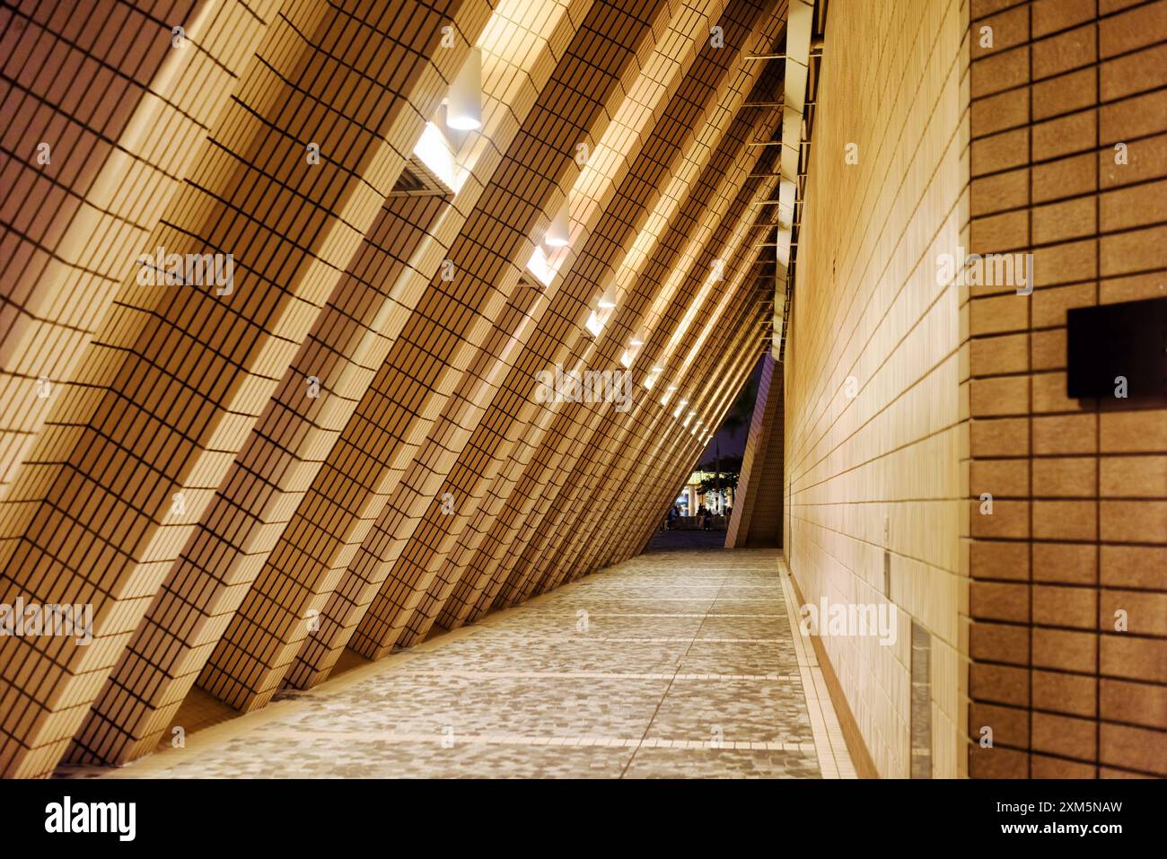 Arched tunnel contiguous to a wall of the building of Hong Kong Stock ...